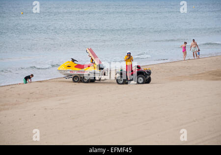 RNLI Lifeguards jet ski and buggy on Bournemouth beach, Dorset, England ...