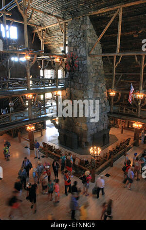This photograph captures the iconic Old Faithful Geyser in Yellowstone ...