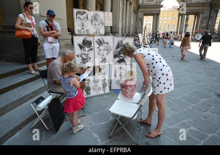Artist working in a square, Florence, Italy Stock Photo - Alamy