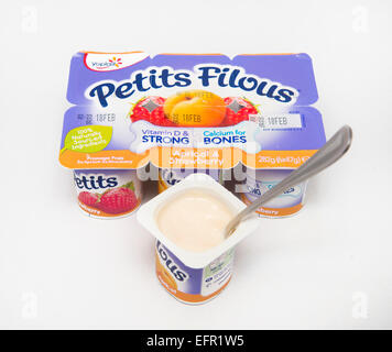 Pot of Yoplait Petits Filous yogurt isolated on white background ...