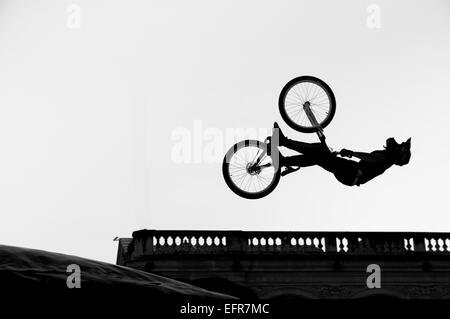 BMX big air freestyle aerial from a vent ramp. A shoe soles, skyward ...