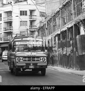 Old Dodge D400 bus used for public transportation driving in the city ...