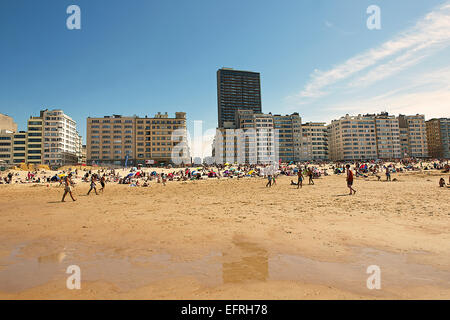 North Sea beach, Ostend, Belgium, waves crushing onto sand at sunset ...