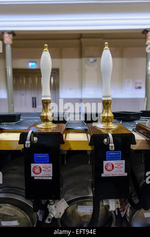 Traditional hand pumps for real ale on the bar of an English pub Stock ...