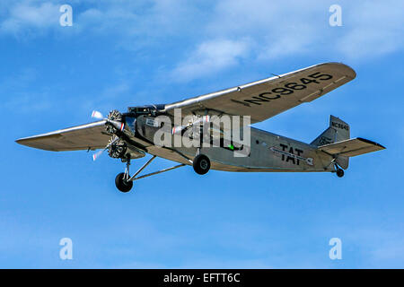 A 1929 Ford 4-AT-E Trimotor plane in the skies over Sarasota Florida ...
