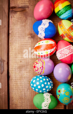 Easter eggs in two rows on grey background. copy space Stock Photo - Alamy