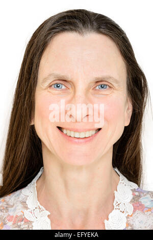 Old smiling woman with happy expression on her face on red studio ...