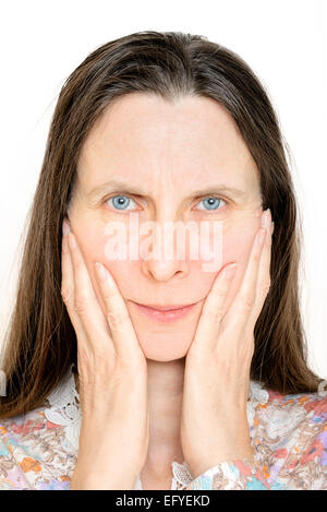 Angry mature woman on white background Stock Photo - Alamy