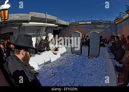 Religious Jews pray in the Rebbe's study at Lubavitch Headquarters in ...