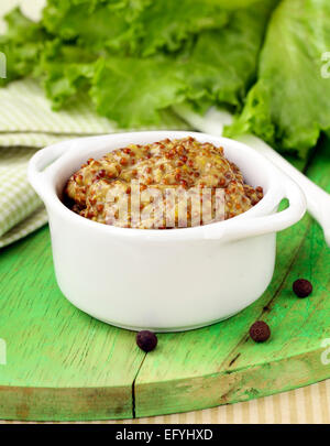 Mustard oil and seed on table with copy space Stock Photo - Alamy