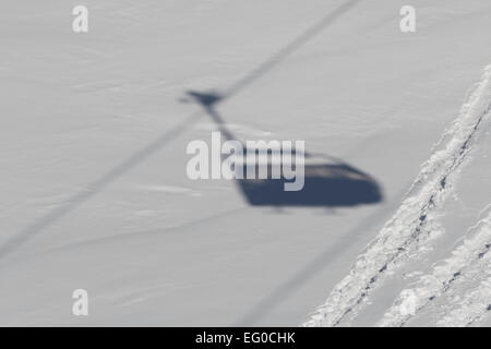 shadow of a skier on a skilift in the alps Stock Photo - Alamy