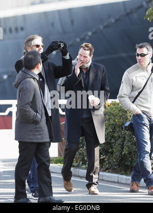 Yokohama, Japan. 13th February, 2015. Keanu Reeves walks arround with ...
