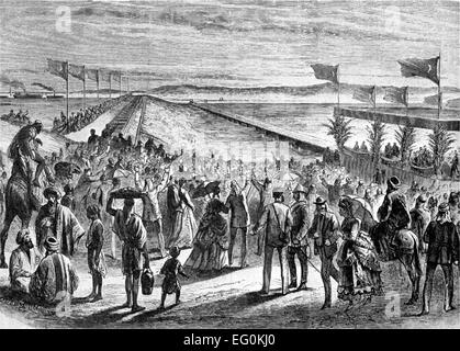 The opening of the Suez Canal in 1869, an artificial sea-level waterway ...