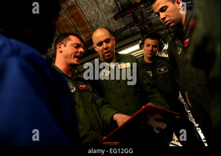 C-17 Loadmaster Staff Sgt. Benjamin Cato from the 21st Airlift Squadron ...