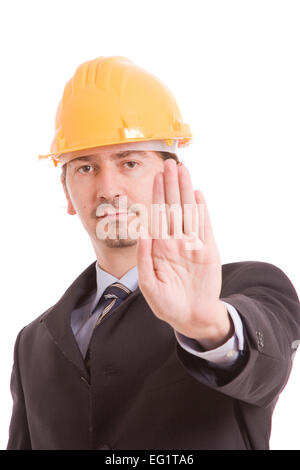 Engineer making stop sign - isolated on white background Stock Photo ...