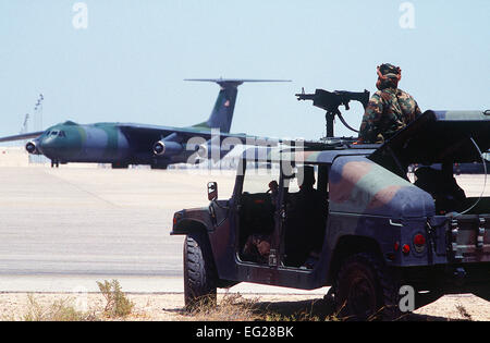 An Air Force security policeman mans a 7.62mm machine gun atop an M998 ...