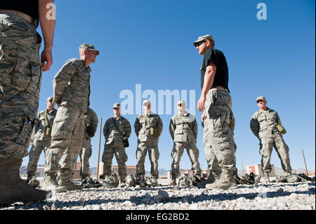 A U.S. Army Ranger School instructor shouts commands to soldiers Stock ...
