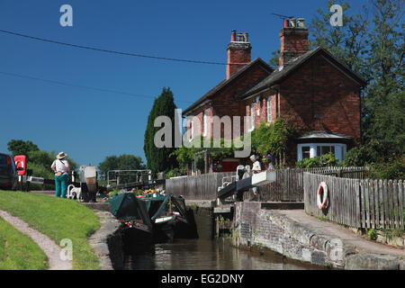 A narrowboat emerging from Shardlow Lock No. 2 on the Trent and Mersey ...