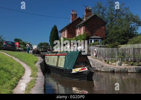 A narrowboat emerging from Shardlow Lock No. 2 on the Trent and Mersey ...