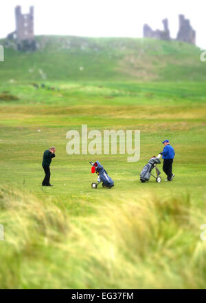Dunstanburgh Castle golf course Stock Photo - Alamy