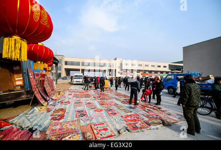 Yanji, China's Jilin Province. 16th Feb, 2015. A dealer sells local ...