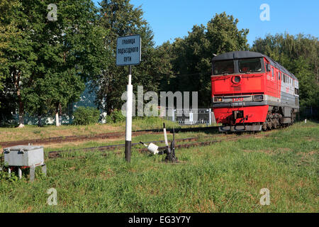 A red & gray Russian 2TE116-918 broad gauge double diesel locomotive in ...