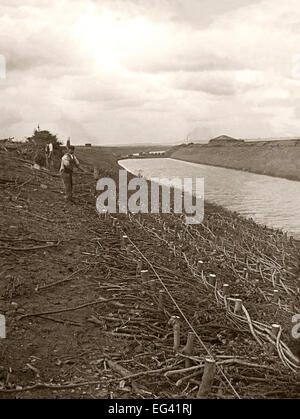 Navvies (construction workers) building the Manchester Ship Canal load ...