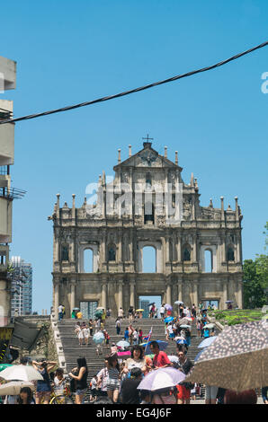Macau, China - Circa 2013 - Tourists crowd in Ruins of St. Paul's, the ...