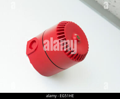 wall mounted Red fire alarm button used to activate warning systems in ...