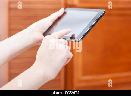 finger clicking touchpad screen in an office Stock Photo - Alamy