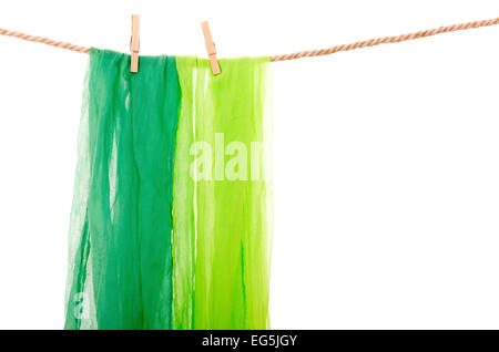 scarfs hanging on a rope clothesline Stock Photo - Alamy