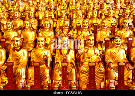 Gold statues of the Lohans in Longhua buddhist temple, Shanghai, China ...