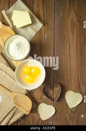 Baking love. Bakery background. Baking ingredients and kitchen utensils ...