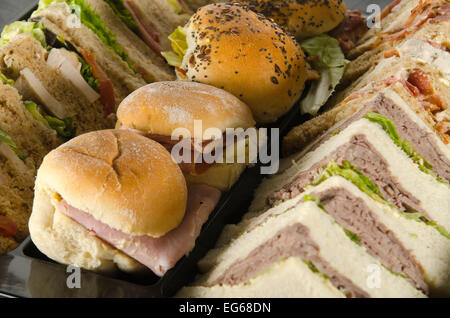 a plate of party food, wraps rolls and sandwiches Stock Photo - Alamy