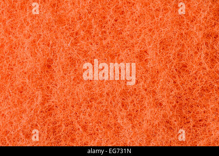 Macro of orange synthetic sponge texture, scrub side Stock Photo - Alamy