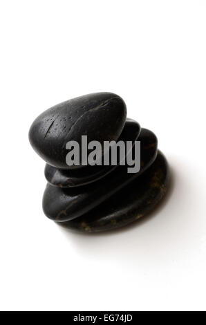 Smooth stones stacked with black background - Stacked pebbles and free ...