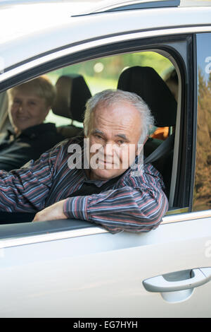 Portrait of female senior driver in car Stock Photo - Alamy