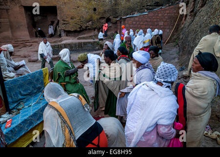 Pilgrims Are Blessed By A Priest At Bete Maryam Church, Lalibela ...