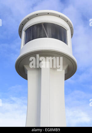 A white lighthouse against the blue sky Stock Photo - Alamy