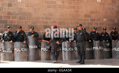 Peru riot police with shields in street at Carnival Cusco cars police ...