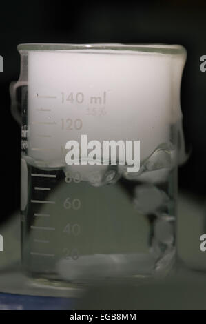 Dry ice reacting with the water placed in laboratory glassware Stock ...