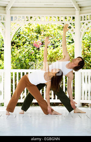 woman practicing yoga in Extended Child pose (Utthita Balasana) on ...
