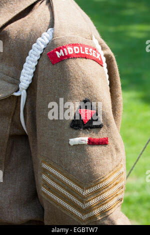 Close up of British army uniform, arm and shoulder patches, circa 1940s ...