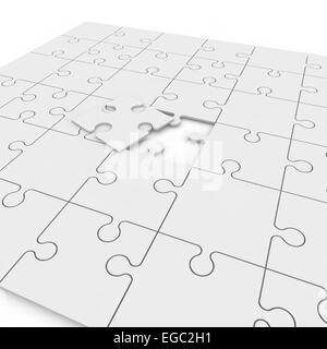Dropped white puzzle of puzzles Stock Photo - Alamy