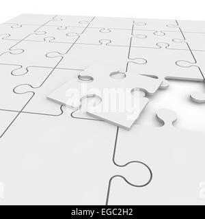 Dropped white puzzle of puzzles Stock Photo - Alamy
