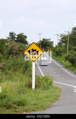 Signposted slope on roadway Stock Photo - Alamy