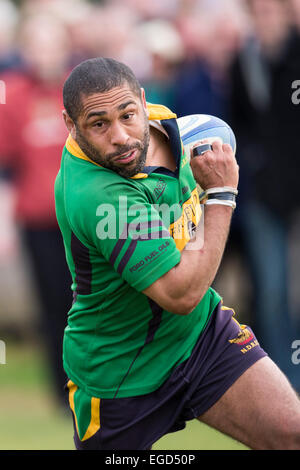 Rugby player running with the rugby ball Stock Photo - Alamy