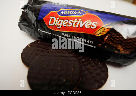 packet of McVitie's milk chocolate Digestives biscuits set on white ...