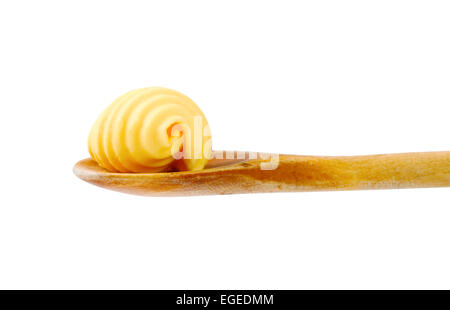 Butter curl on wooden spoon Stock Photo - Alamy