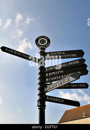 Tourist information street sign giving directions made out of slate in ...